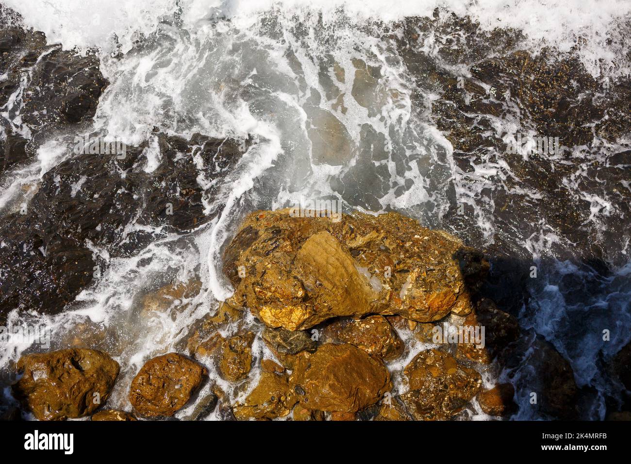 Wonderful views of the blue Mediterranean Sea. Sunny rocks, waves with ...