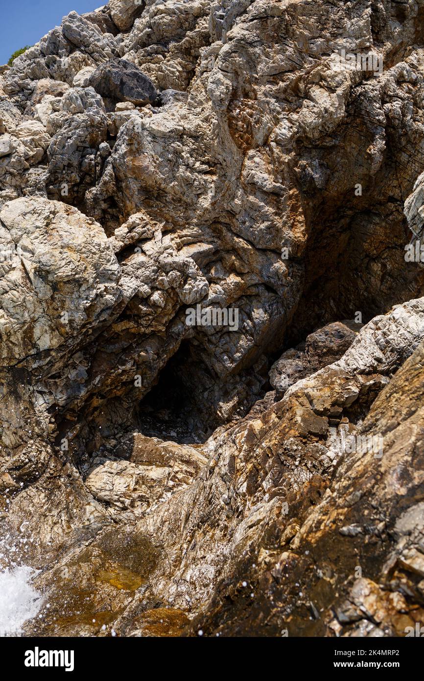 Wonderful views of the blue Mediterranean Sea. Sunny rocks, waves with ...