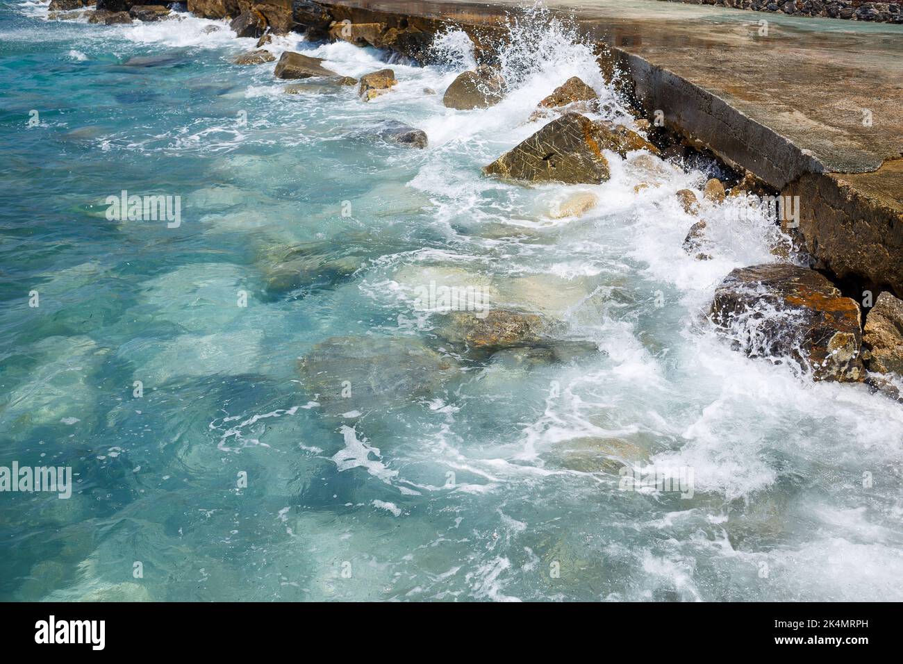 Wonderful views of the blue Mediterranean Sea. Sunny rocks, waves with ...