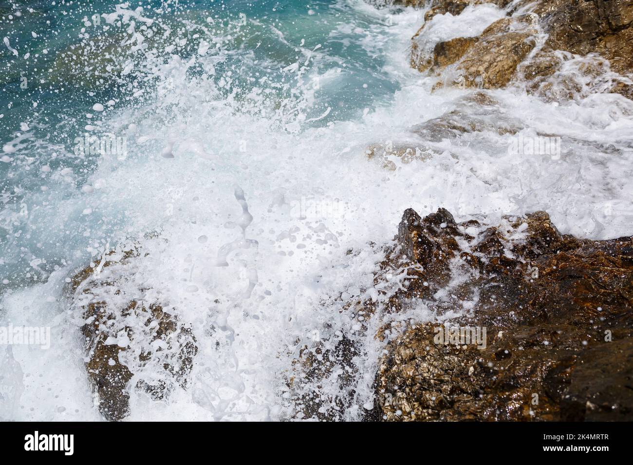 Wonderful views of the blue Mediterranean Sea. Sunny rocks, waves with ...