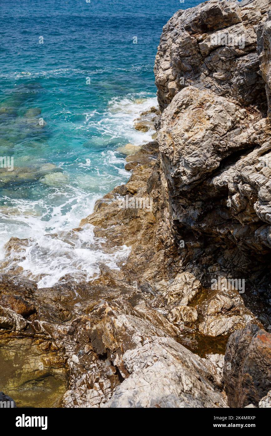 Wonderful views of the blue Mediterranean Sea. Sunny rocks, waves with ...
