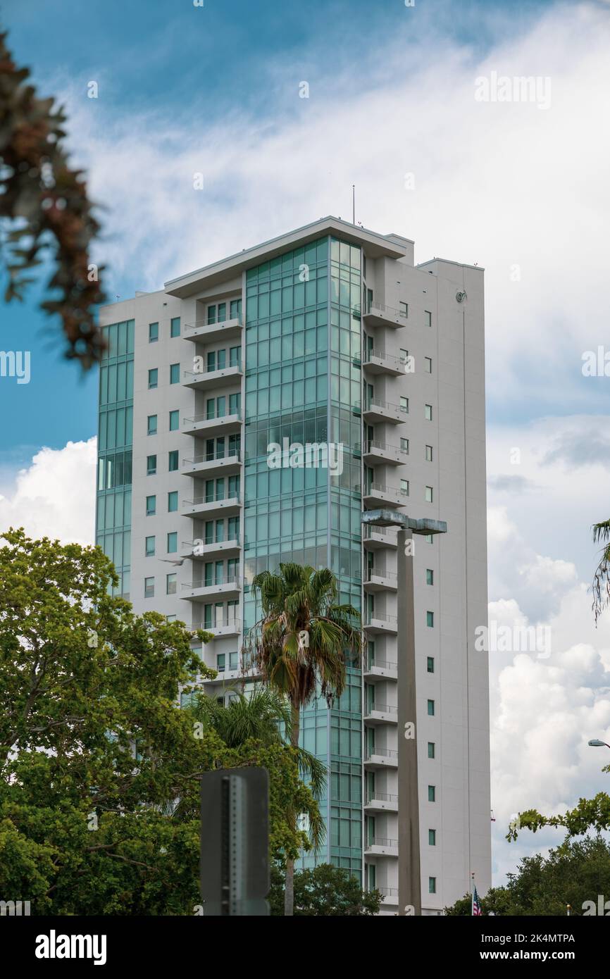 Beautiful residential building surrounded by trees Stock Photo - Alamy