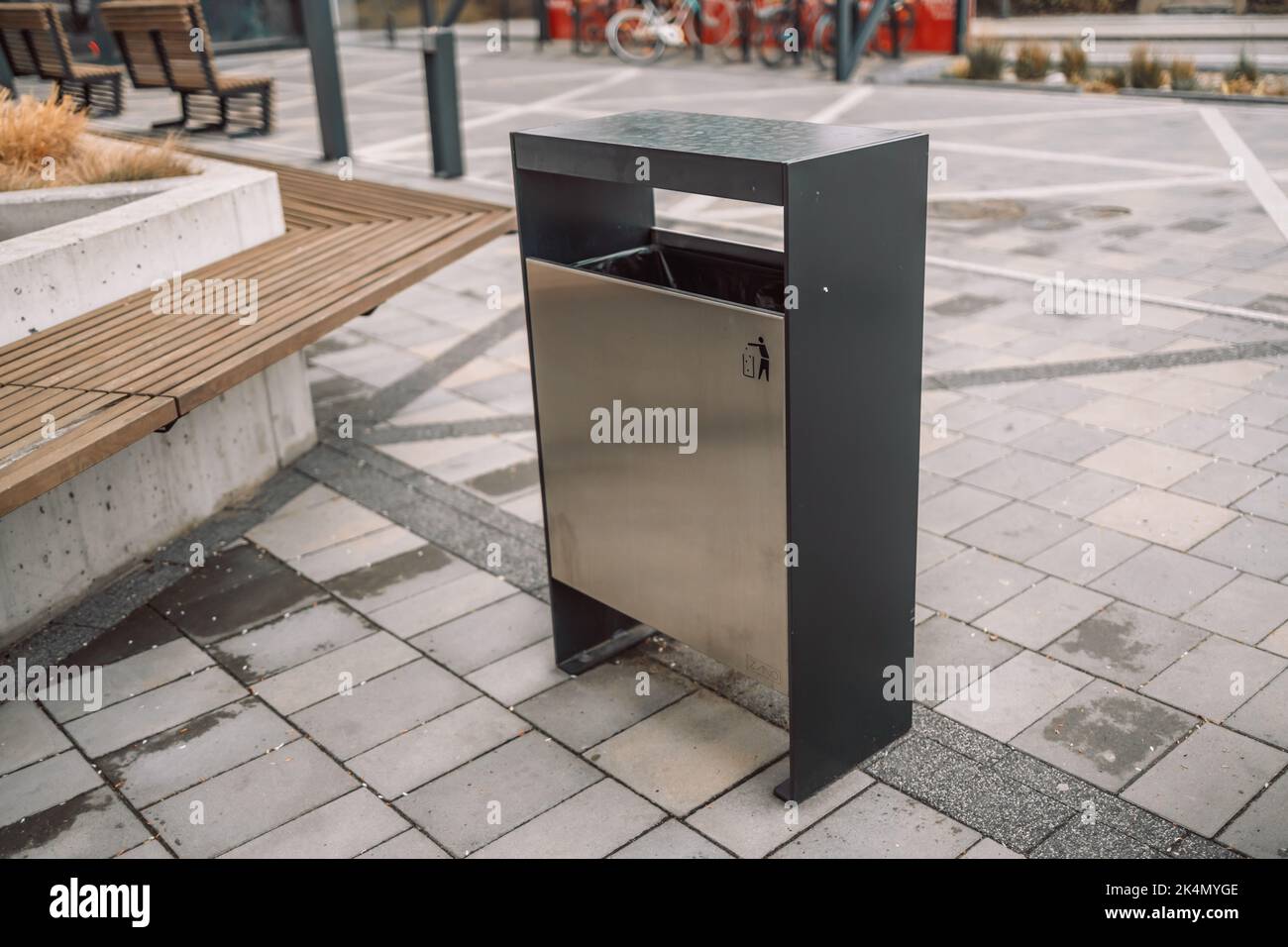 A modern smart trash can on the street in Krakow, Poland. Collection of ...