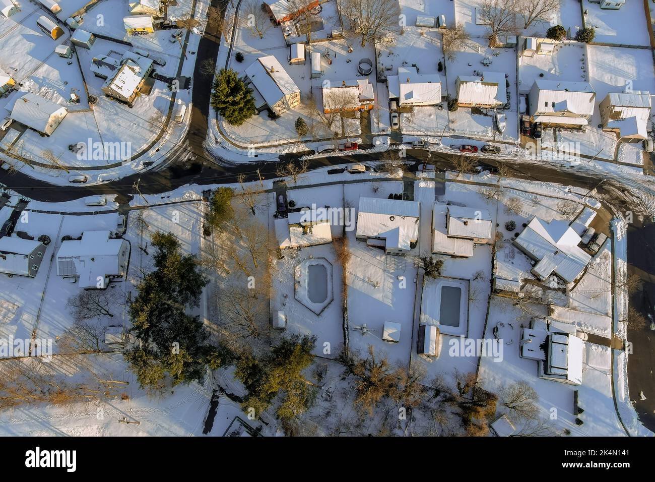 As a result of a severe snowstorm, roofs of a number of residential ...
