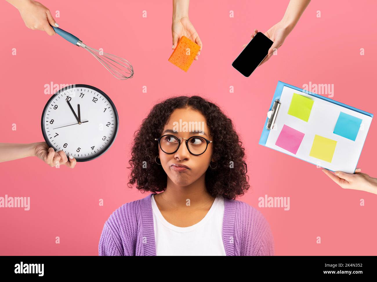 Confused young black woman having difficulties with time management ...