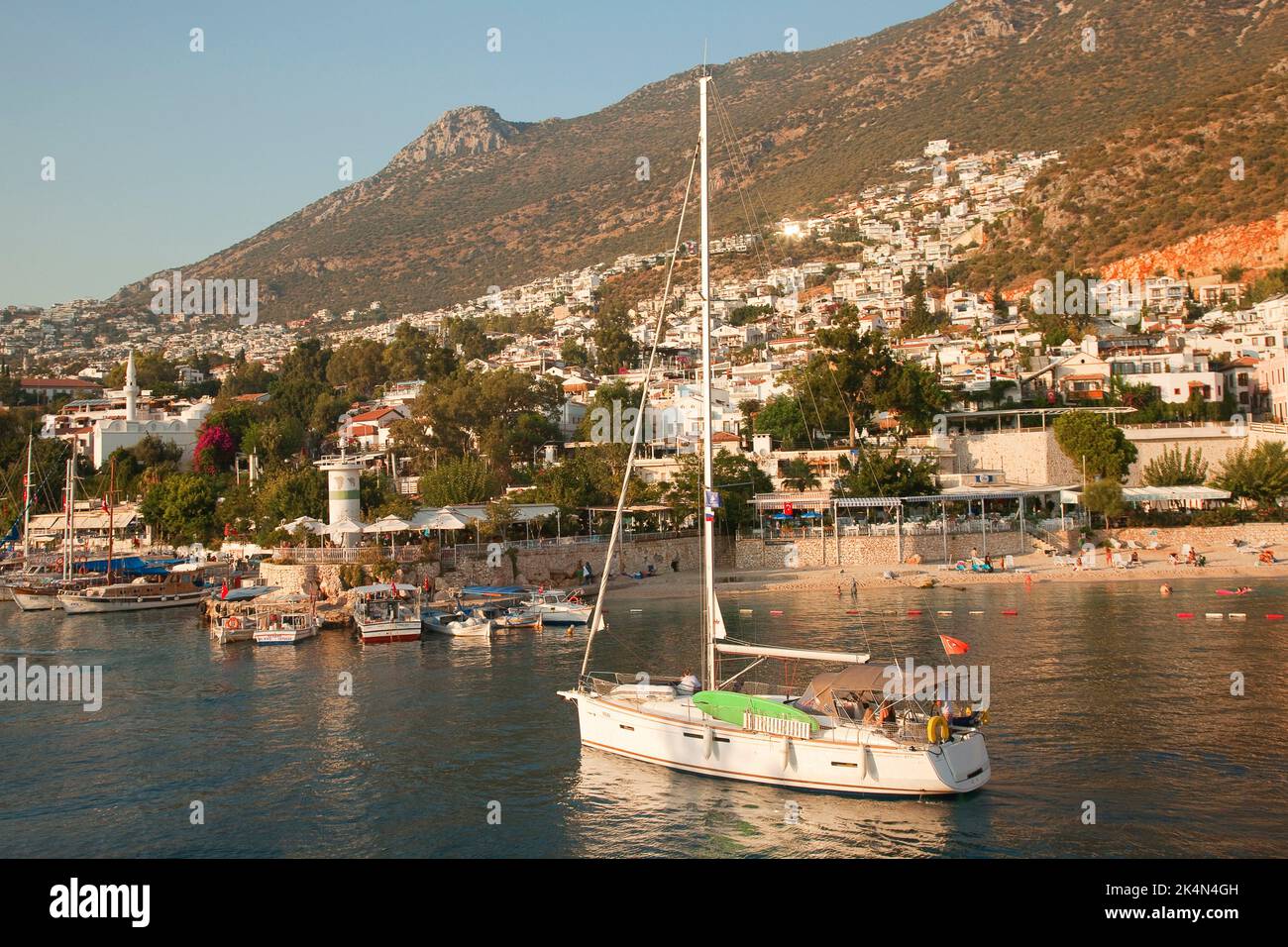 Daily excursion boat turning back from the trip to the port of Kalkan ...