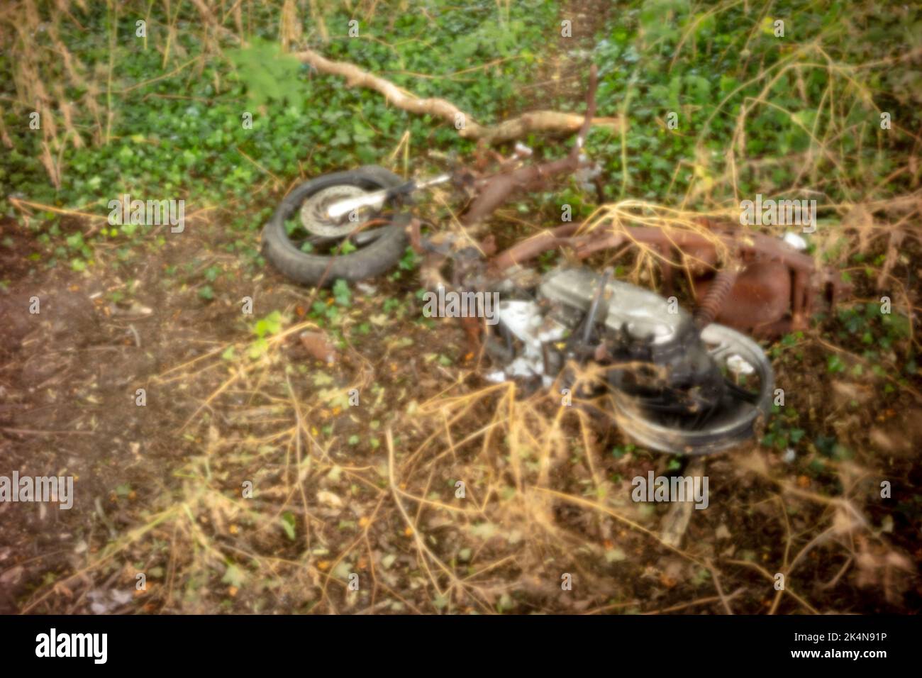 Environmental pollution and waste exemplified by motorcycle carelessly ...