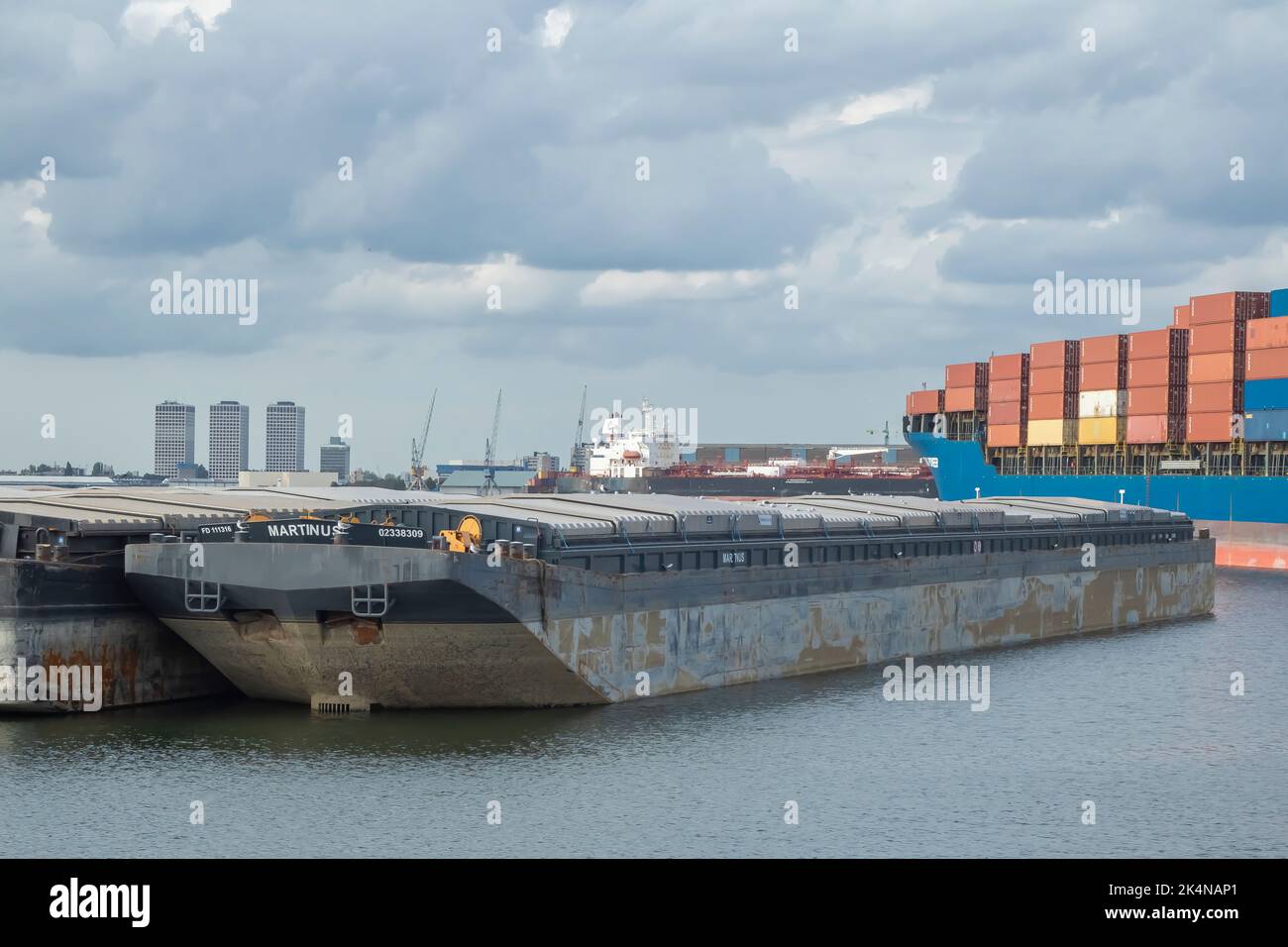 Ships and barges moored at Rotterdam port, The Netherlands Stock Photo ...
