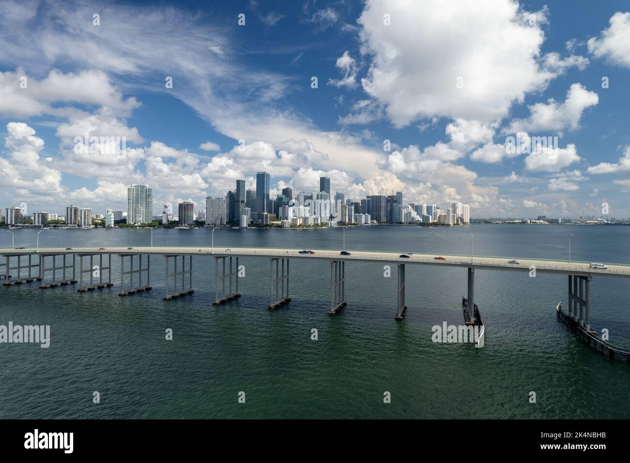 An aerial view of the Miami city skyline at the waterfront with a ...