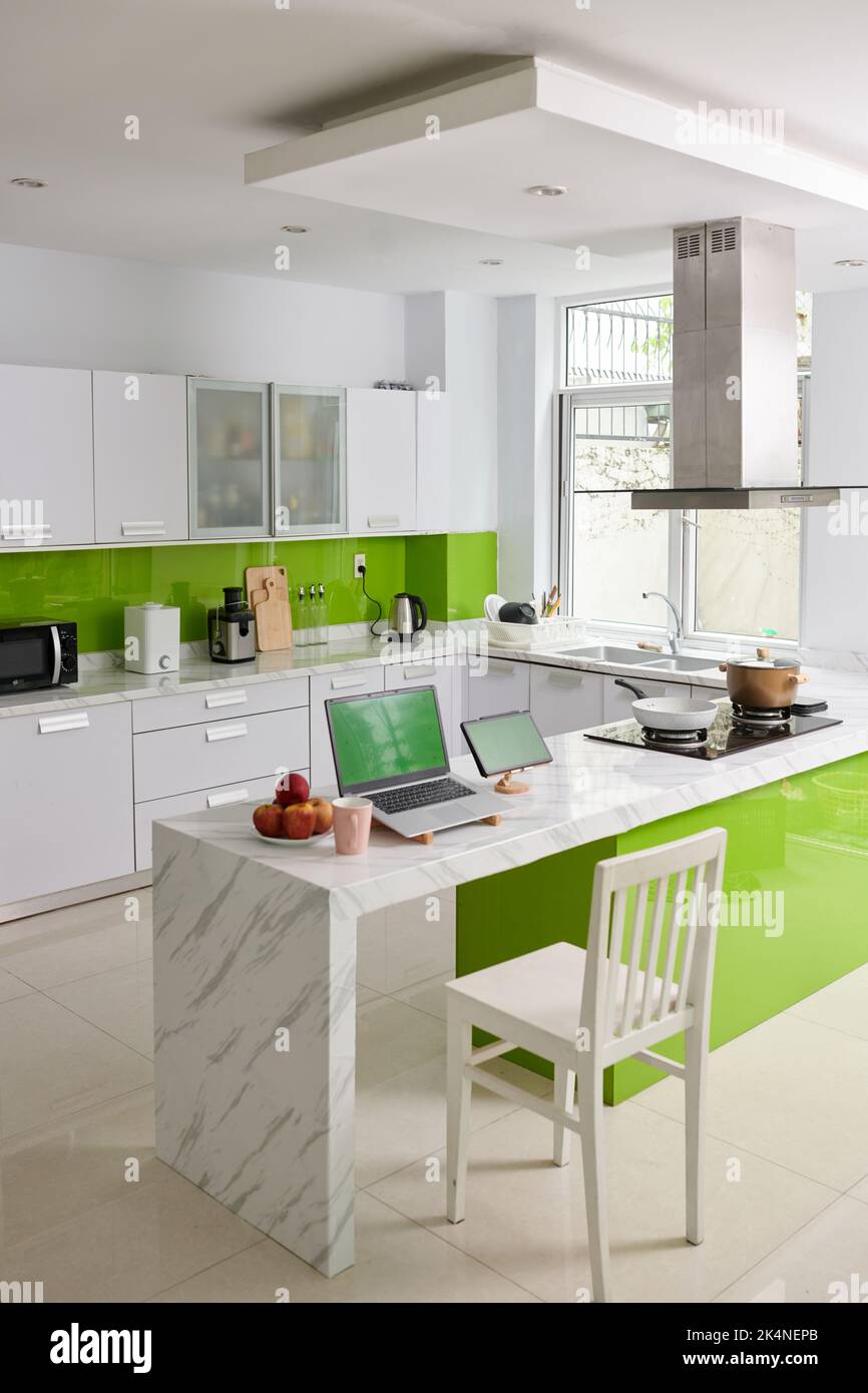 Laptop green screen on kitchen hi-res stock photography and images - Alamy