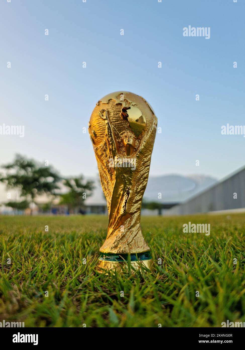 Trophy of the FIFA World Cup against the background of the Al Janoub ...