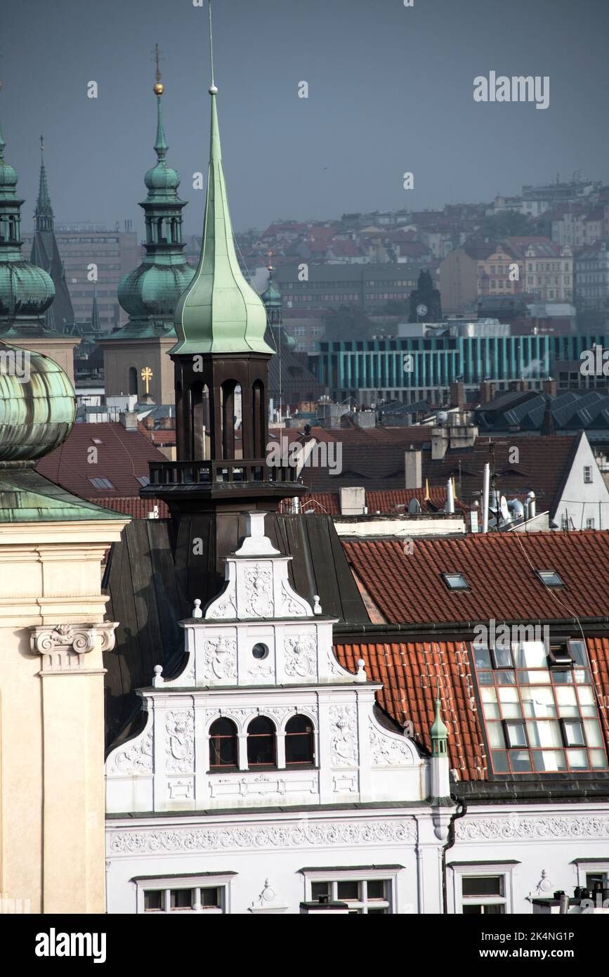 A vertical of roofs and spires of Prague towers Stock Photo - Alamy