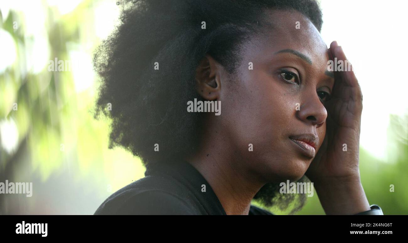 Preoccupied black woman feeling stress and pressure. African person ...