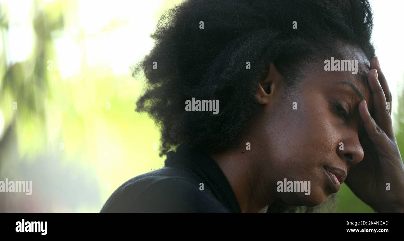 Preoccupied black woman feeling stress and pressure. African person ...