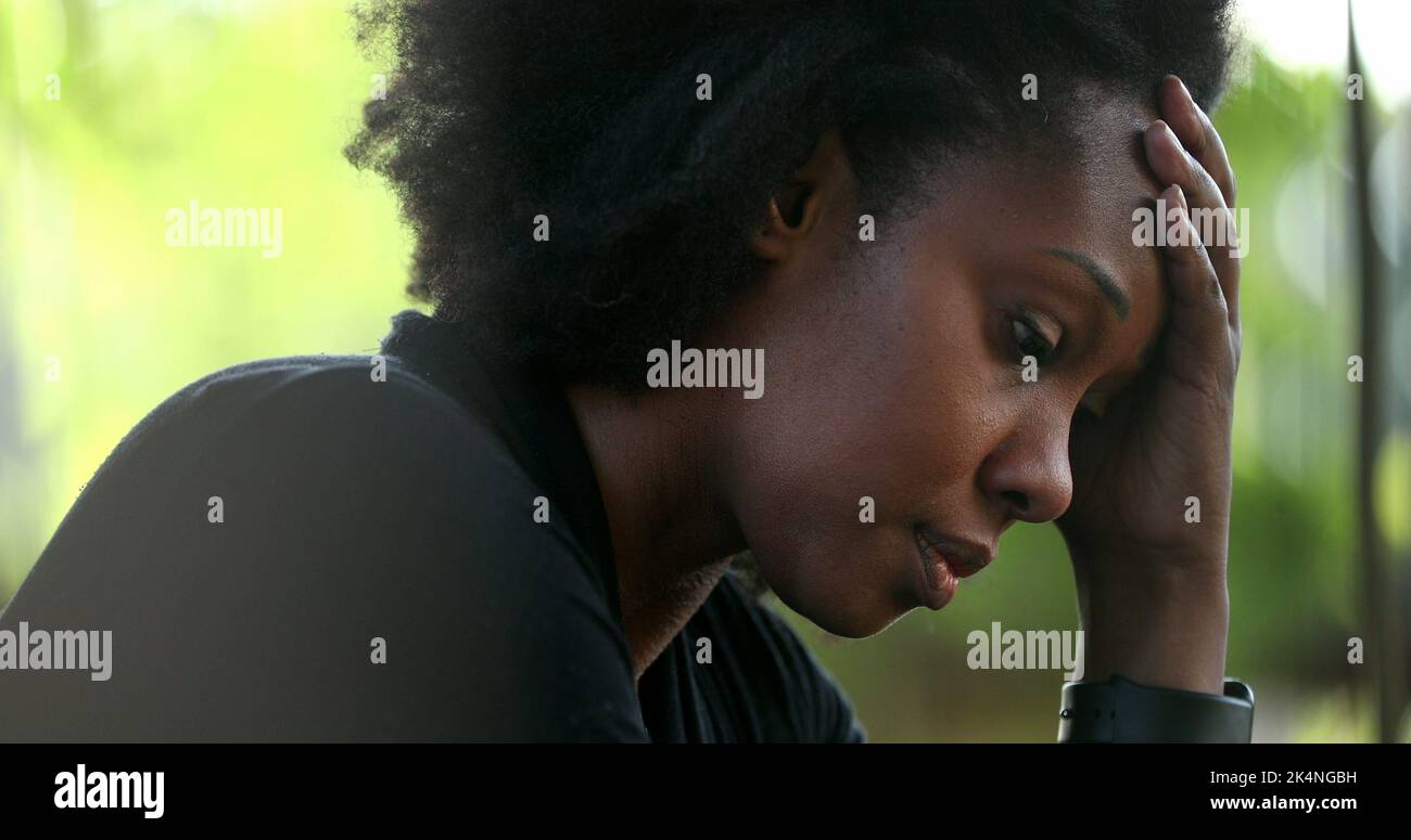 Preoccupied black woman feeling stress and pressure. African person ...