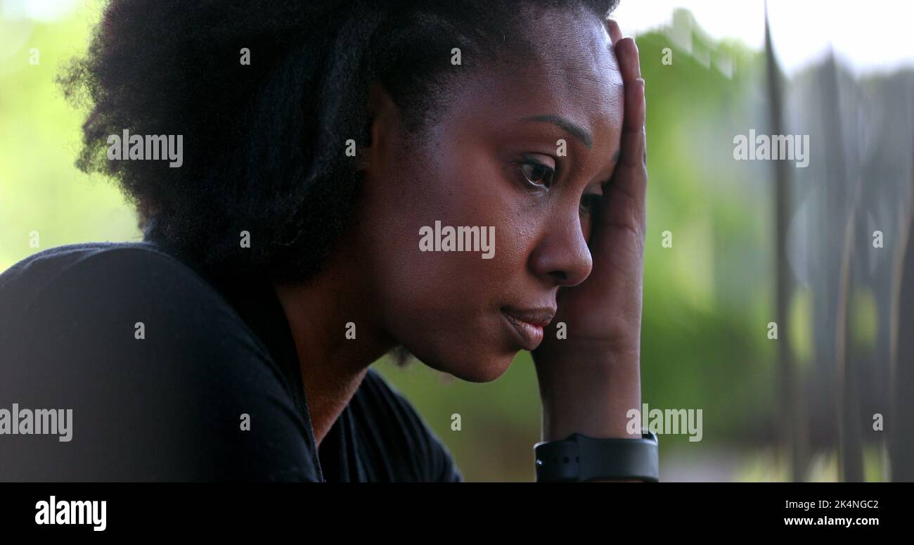 Preoccupied black woman feeling stress and pressure. African person ...