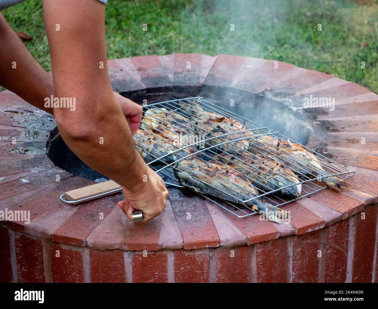 Traditional fish bbq hi-res stock photography and images - Alamy