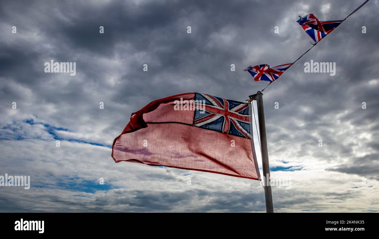 A Red Flag with Union Jack Stock Photo - Alamy