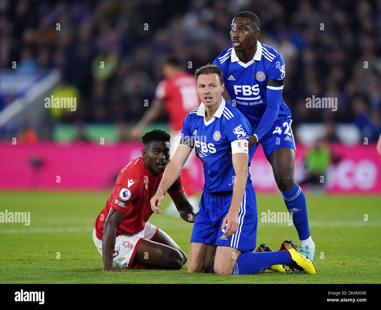 Nottingham Forest's Taiwo Awoniyi and Leicester City's Jonny Evans ...