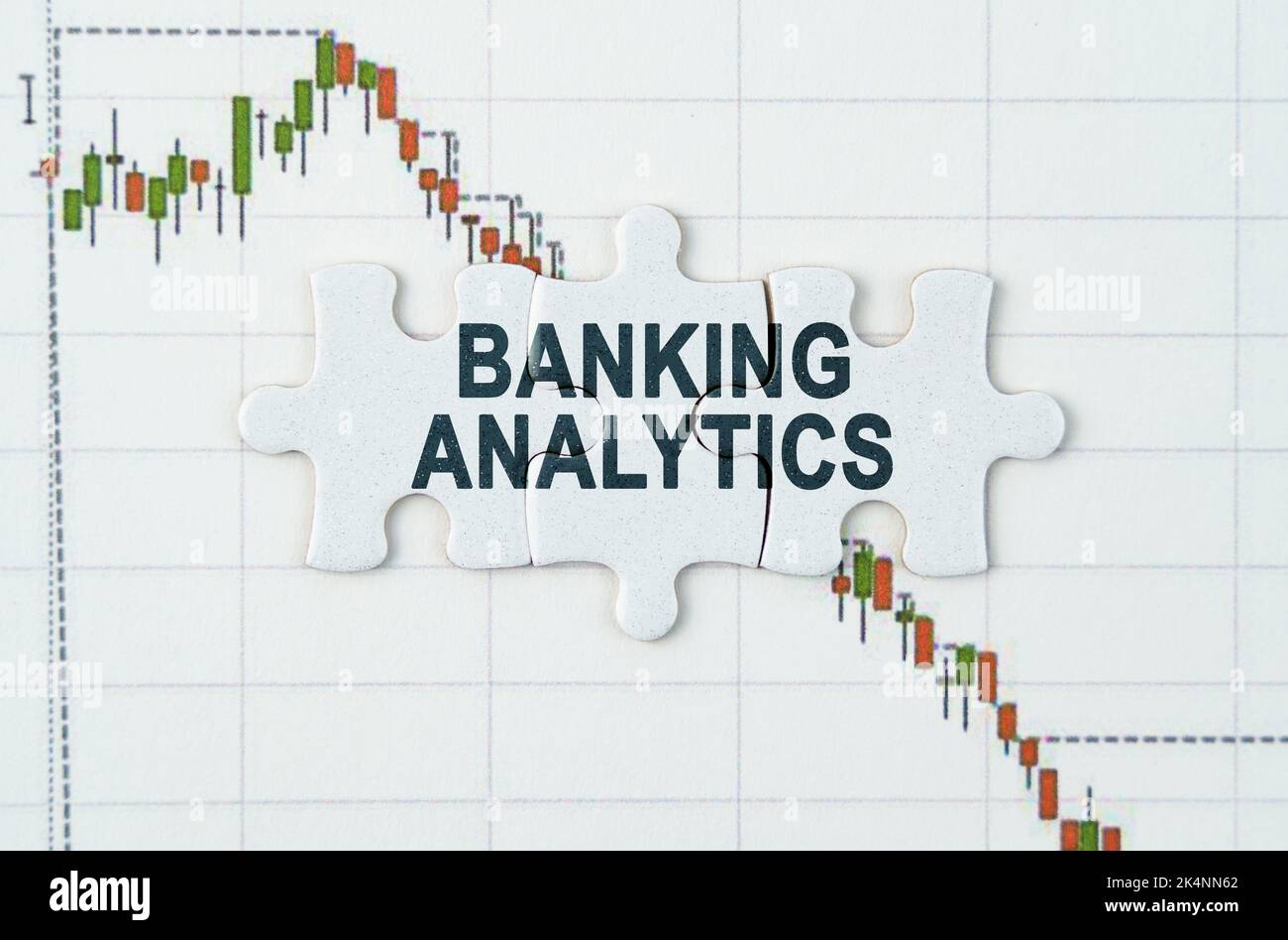 Business concept. On the quotes chart there are puzzles with the ...