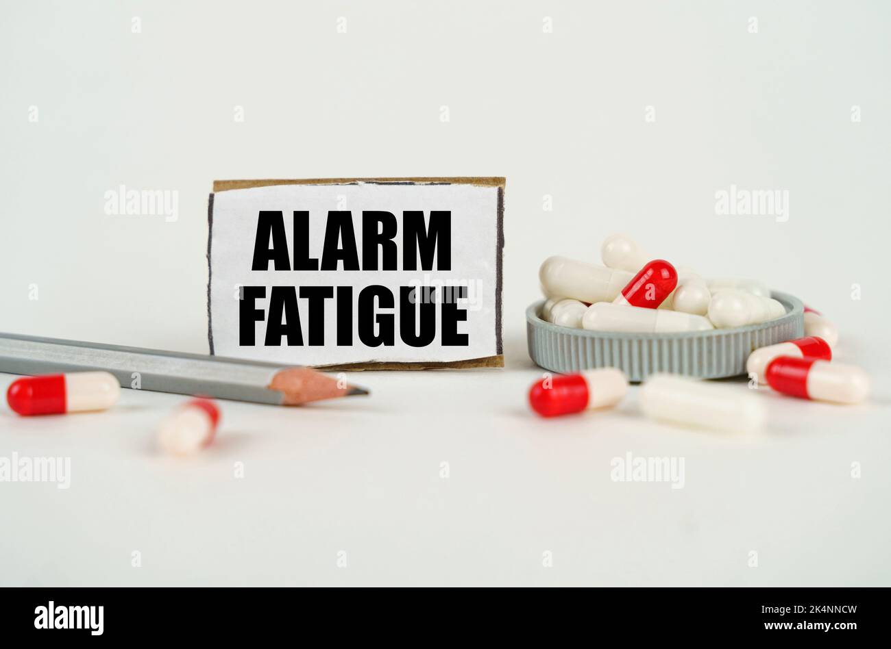 Medical concept. On a white background, medical capsules, a pencil and ...