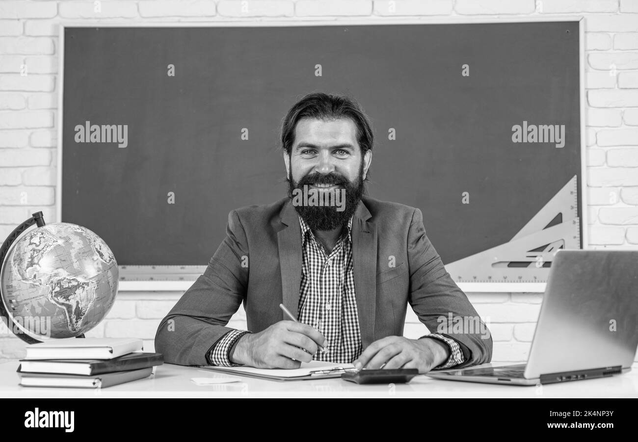 man with beard and moustache look as businessman or teacher in college ...