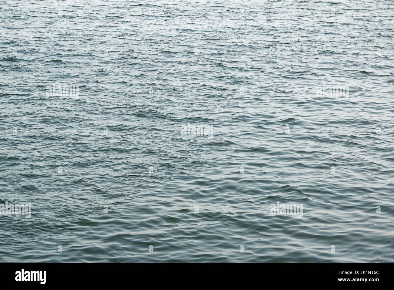 Abstract background of river water flow under the influence of light ...