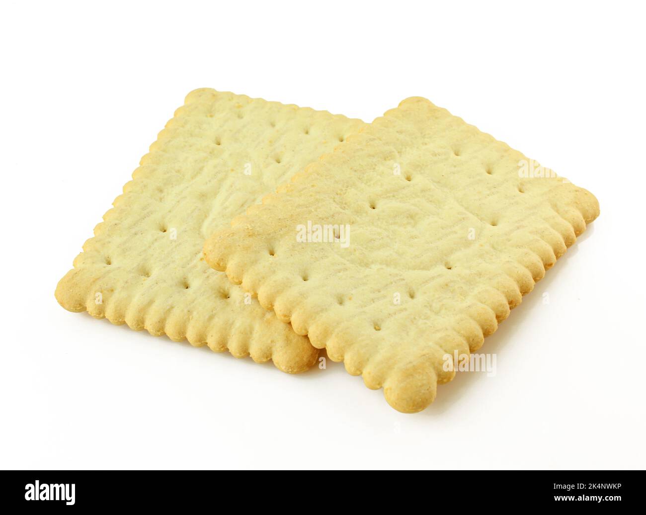 Two buttery square shaped tea biscuits isolated on white background ...