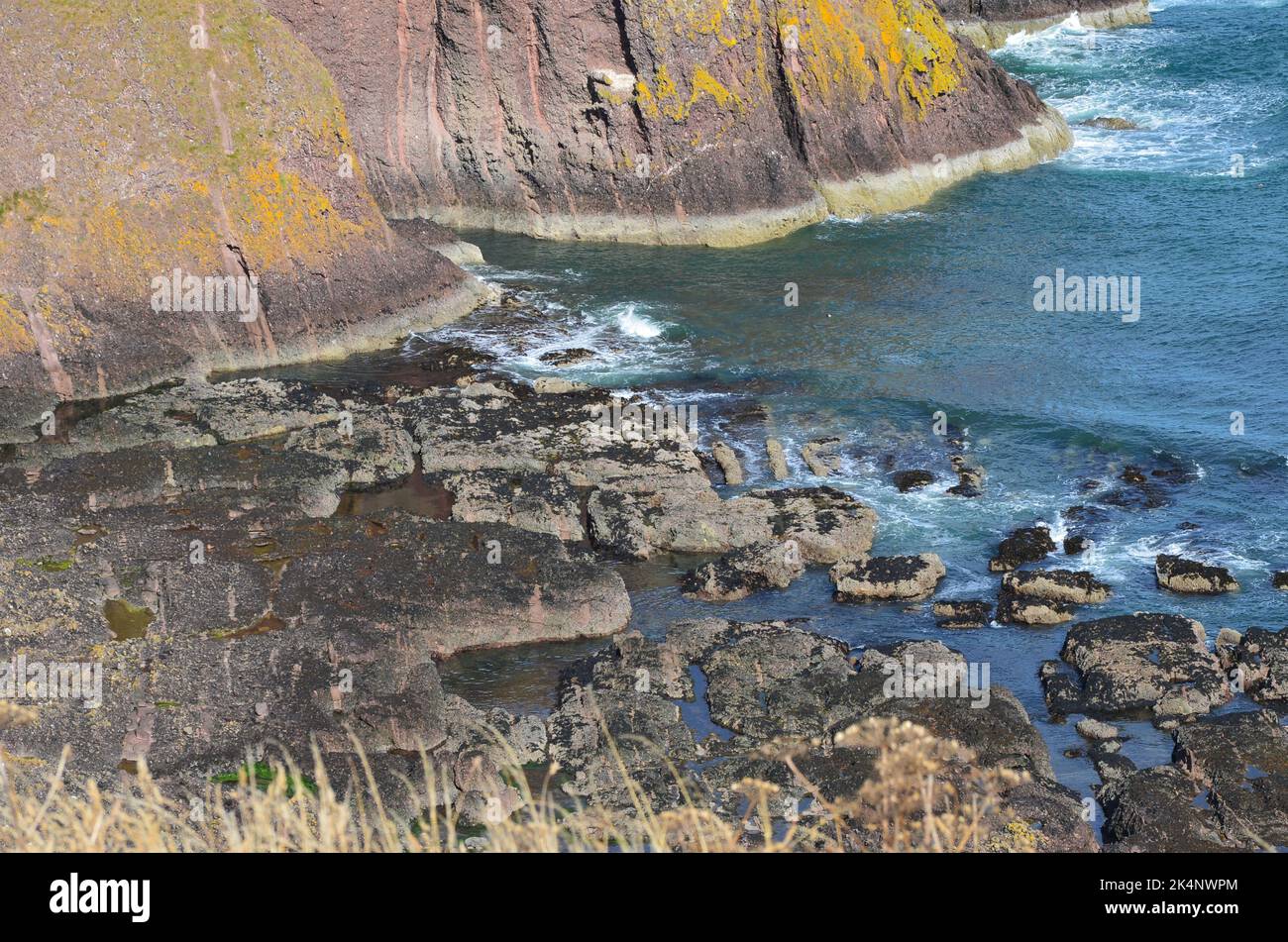 Sea cliffs along the coastal path for Dunottar Castle, Stonehaven ...