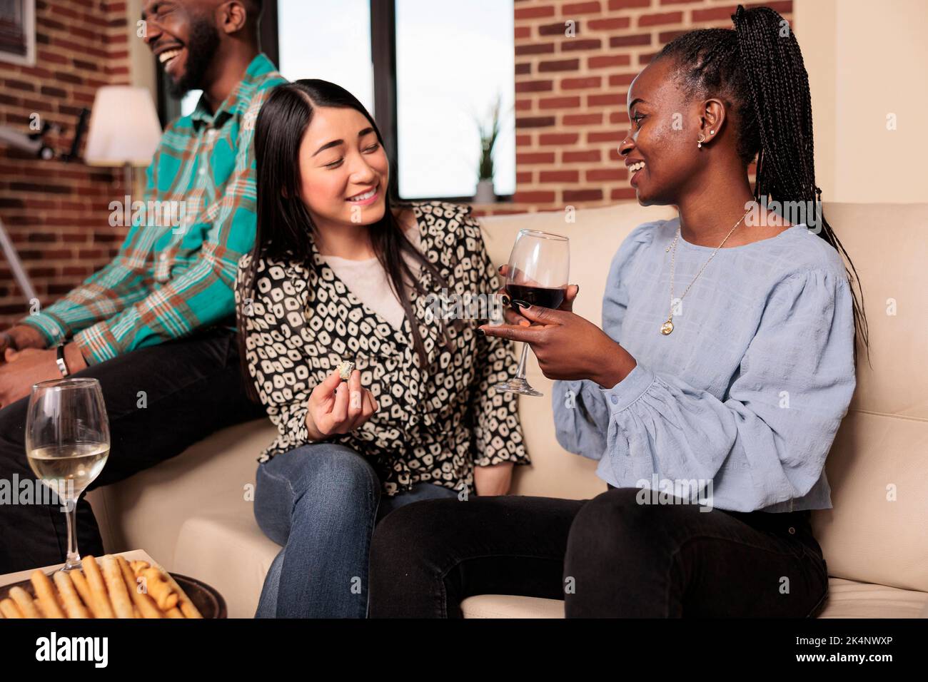Cultural diverse nationalities, ethnicities women couple chatting ...