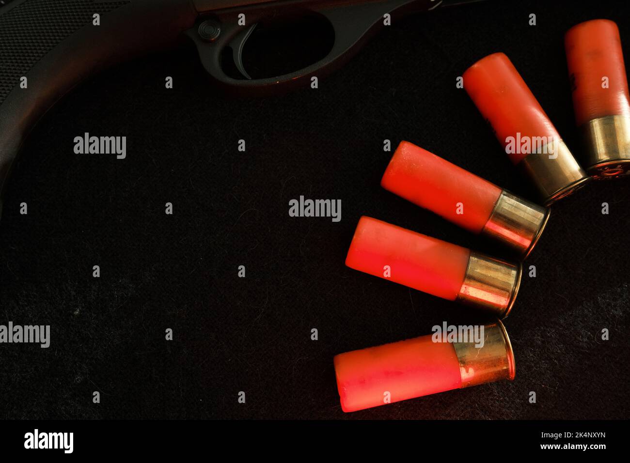 Trigger of a rifle on black background with red lightning with Shotgun ...
