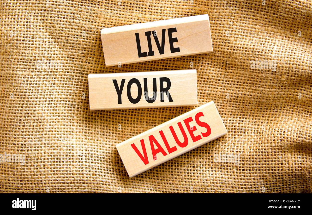 Live your values symbol. Concept words Live your values on wooden ...