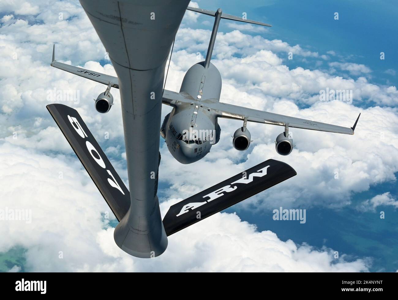 A C-17 Globemaster assigned to the 305th Air Mobility Wing, Joint Base ...