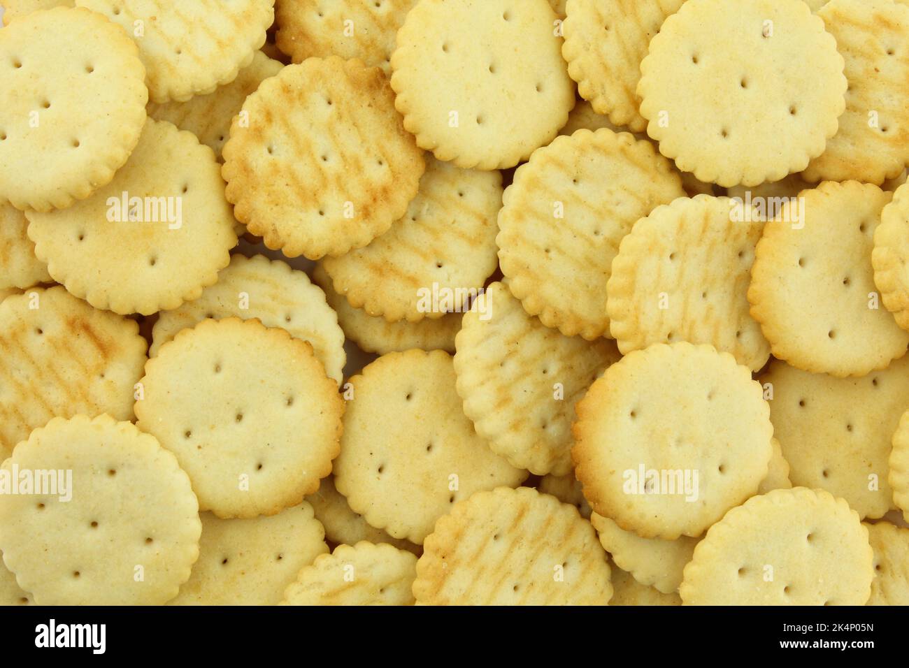 Full background texture of salty round crackers Stock Photo - Alamy