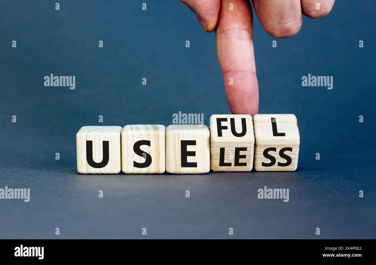 Useful or useless symbol. Concept words Useful or Useless on wooden ...