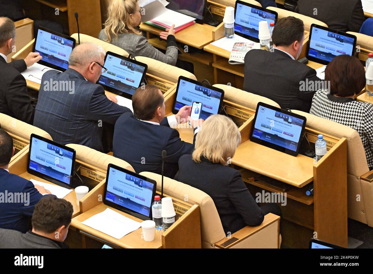 Extraordinary plenary session of the State Duma of Russia. MPs during ...