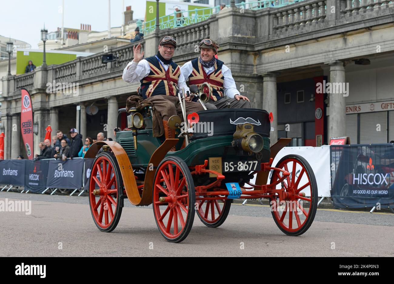 The drive of a 2 cylinder, 8 HP, 1901 Albion waves as he heads for the ...