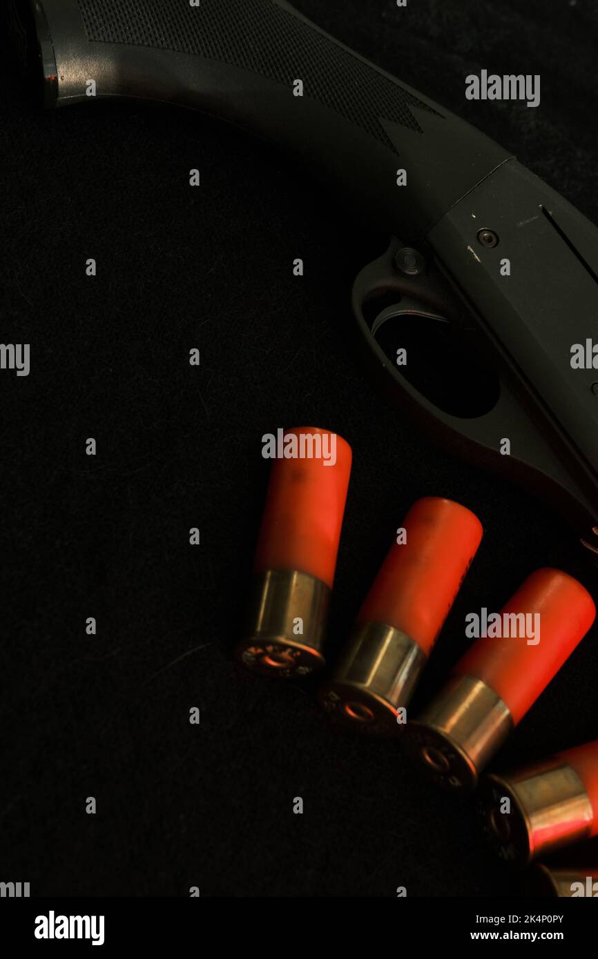 Trigger of a rifle on black background with red lightning with Shotgun ...