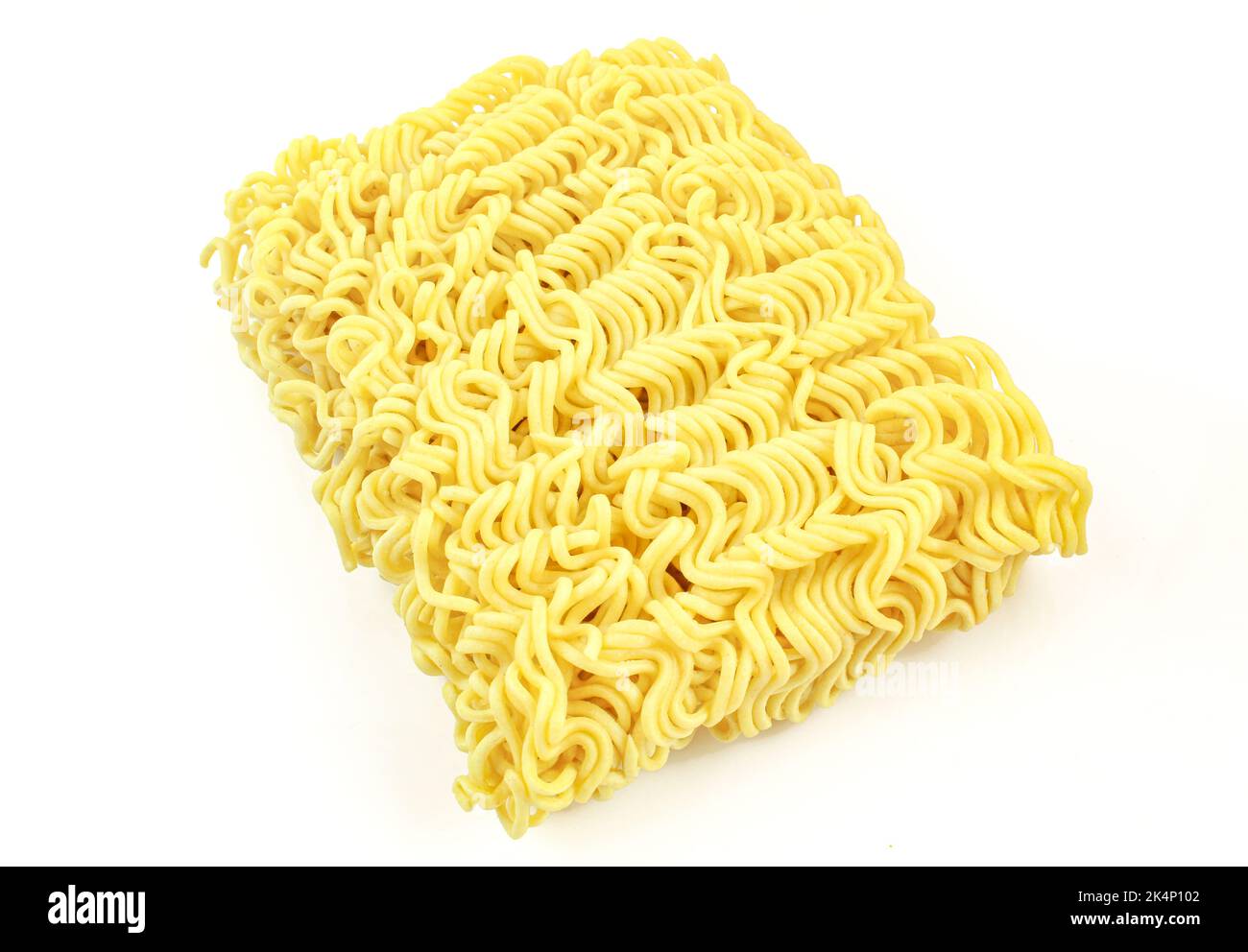 Uncooked asian ramen pasta block isolated on white background. Raw ...