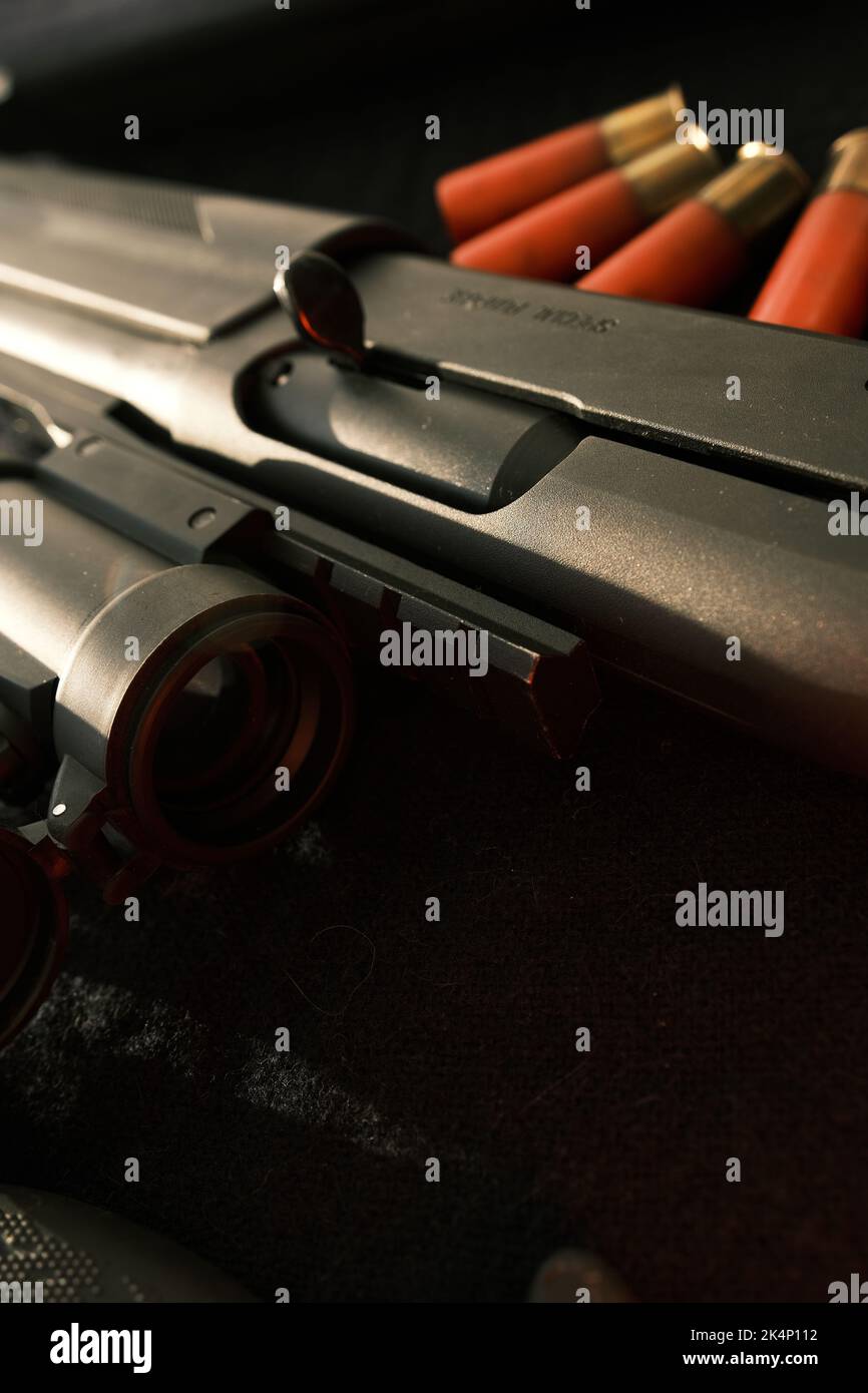 Closeup shotgun shutter. Hunting semi-automatic shotgun with wooden ...