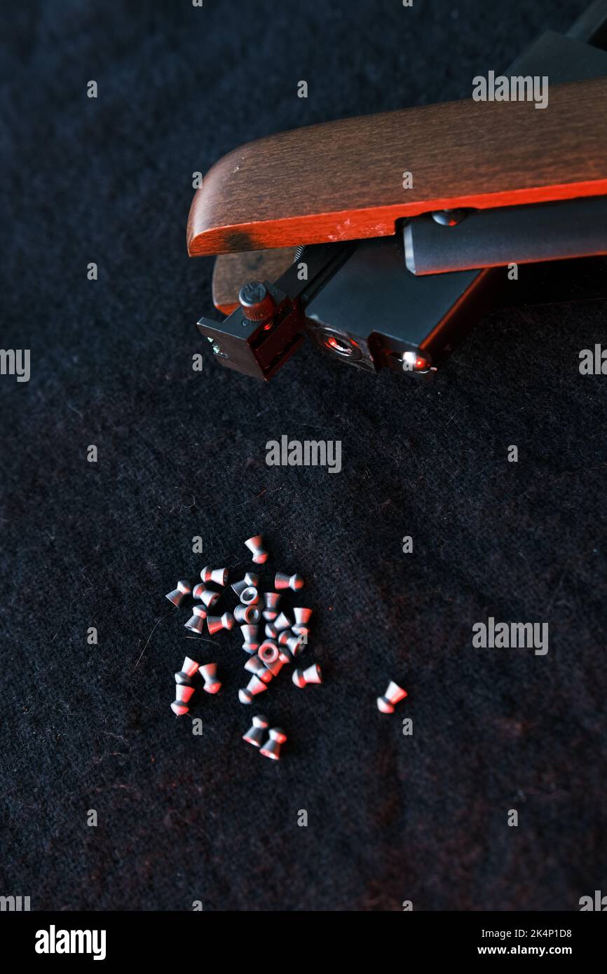 Rifle gun break in two with air pellets for hunting on cloth dark ...