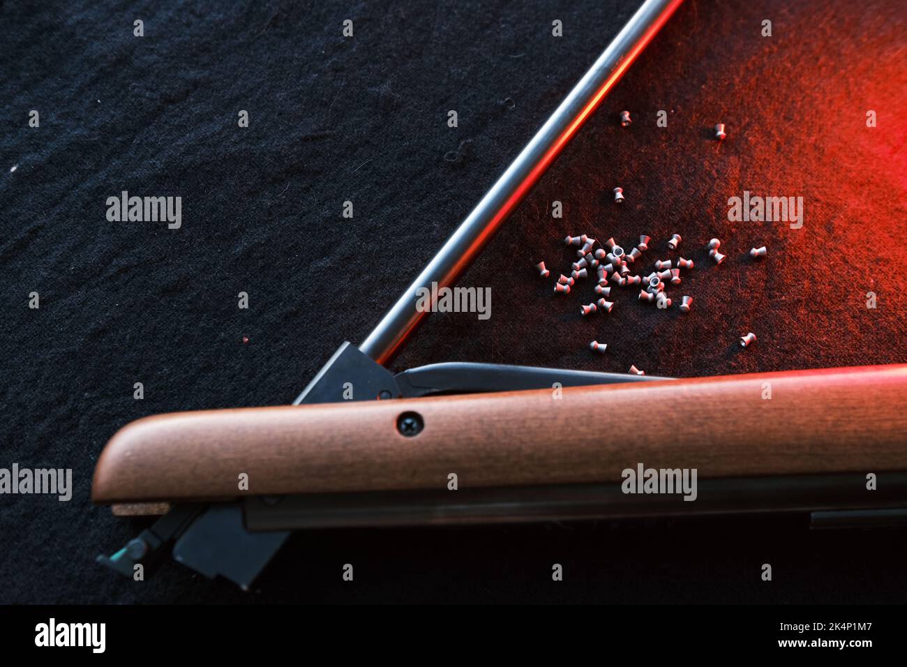 Rifle gun break in two with air pellets for hunting on cloth dark ...