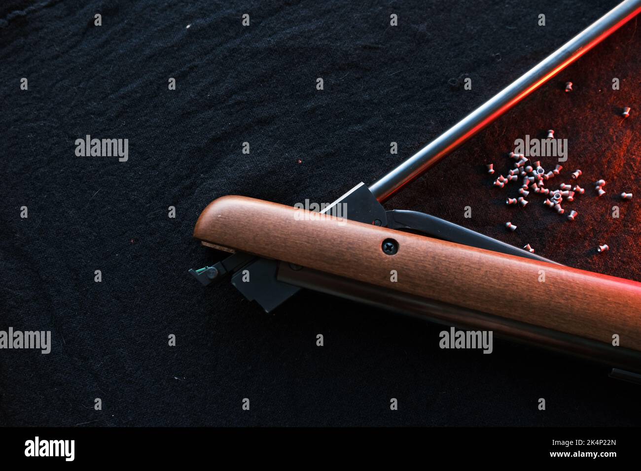 Rifle gun break in two with air pellets for hunting on cloth dark ...