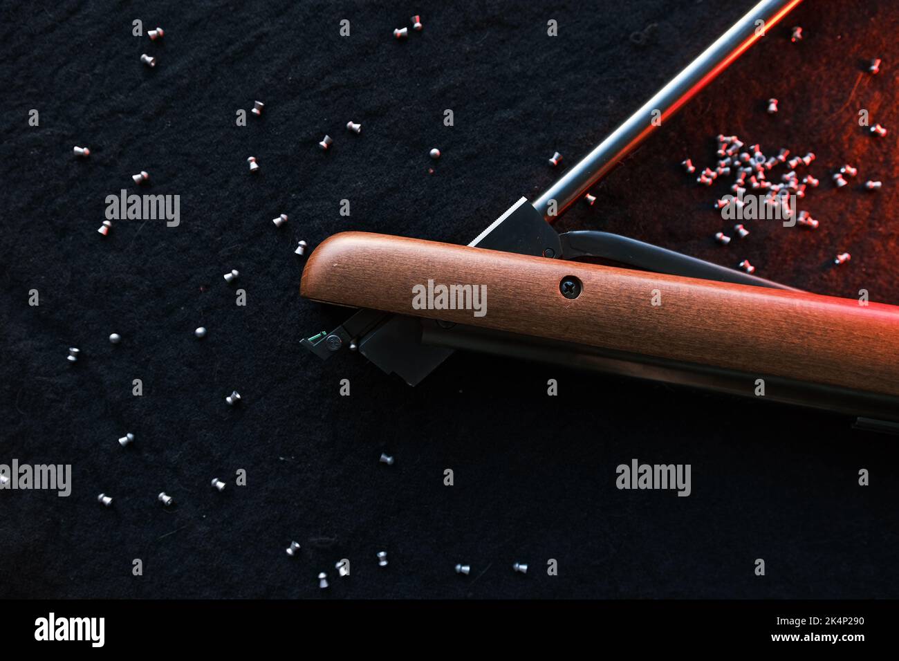 Rifle gun break in two with air pellets for hunting on cloth dark ...