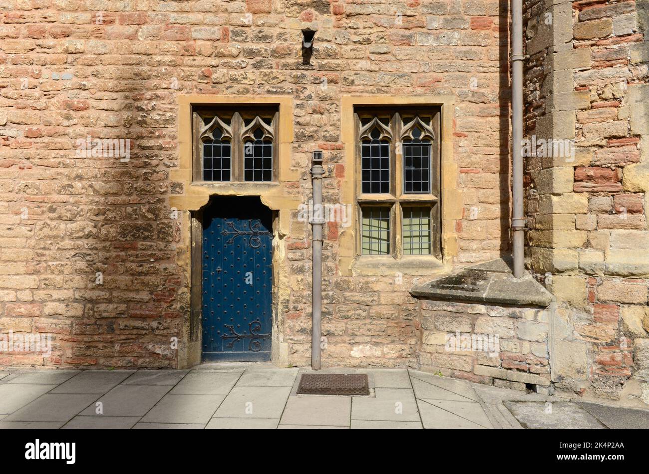 Window and door in a building near Wells cathedral, Wells, Somerset, UK ...