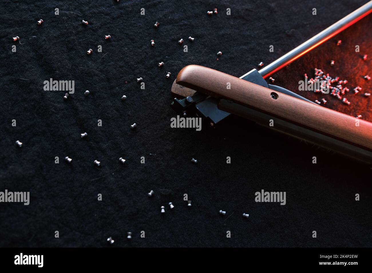 Rifle gun break in two with air pellets for hunting on cloth dark ...