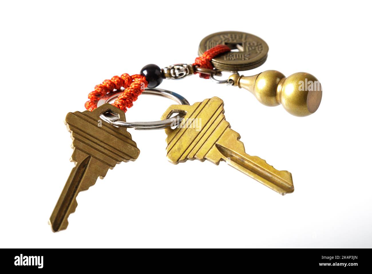 A set of house keys isolated on a white background with copy space ...