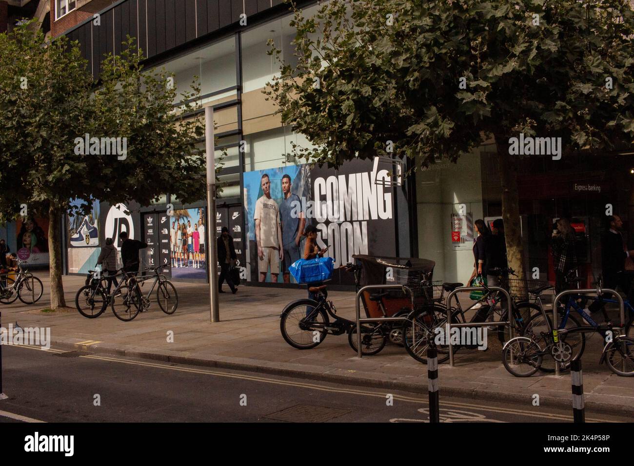 King Street, Hammersmith, London, UK; large poster advertising store Coming Soon Stock Photo - Alamy