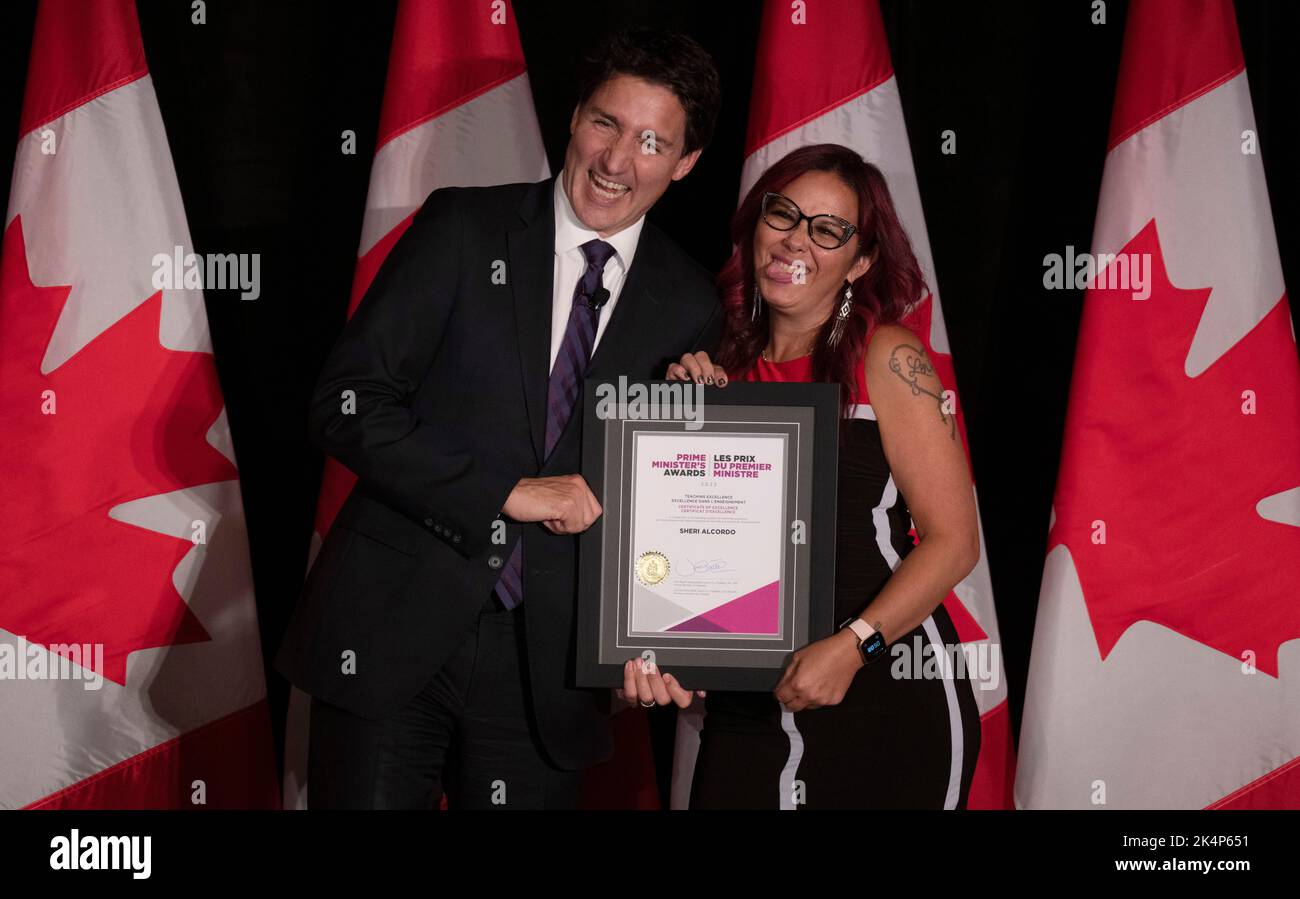 Prime Minister Justin Trudeau reacts as Sheri Alcordo, from Gulfstream ...