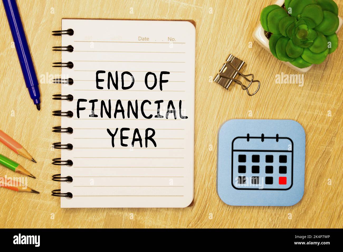 Finance and economics concept. The man is holding a pen and a notebook ...
